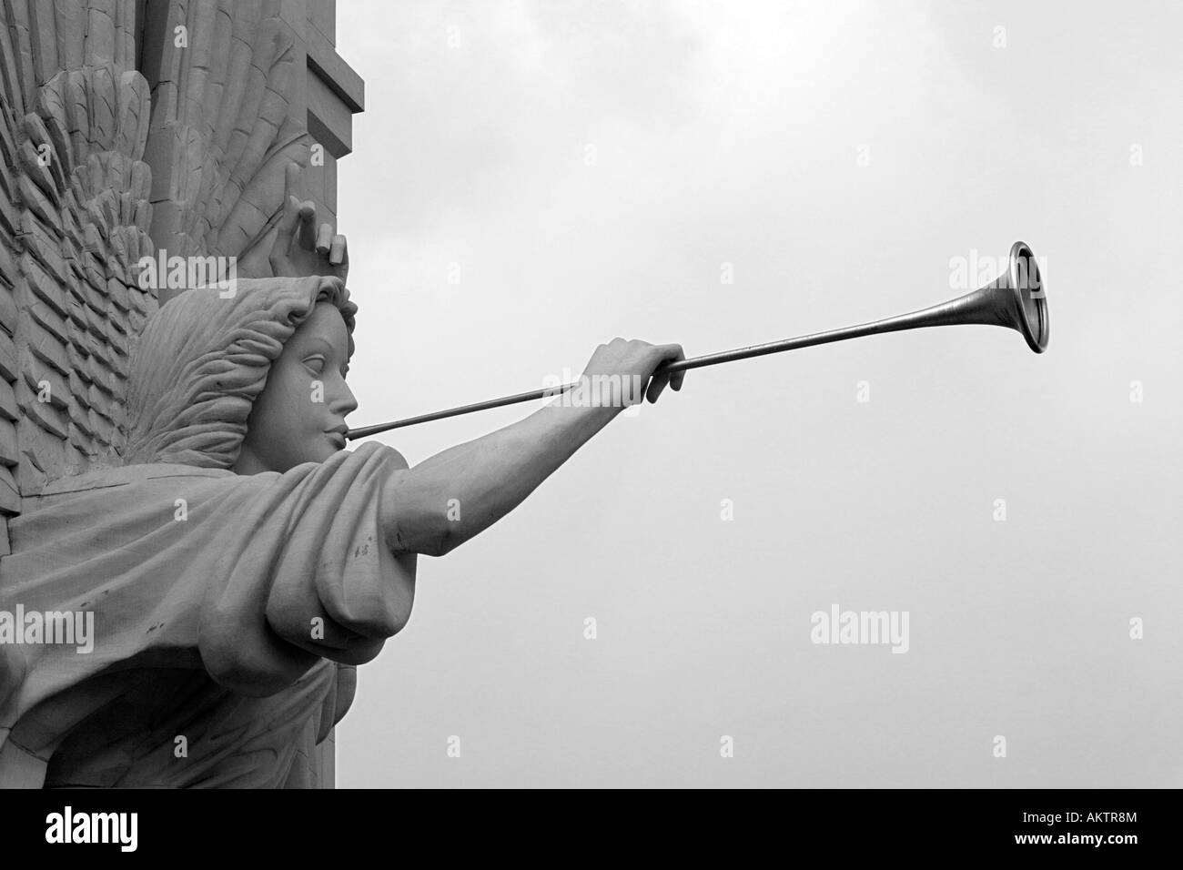 Angel Statue Heralds Golden Trumpet Stock Photo - Alamy