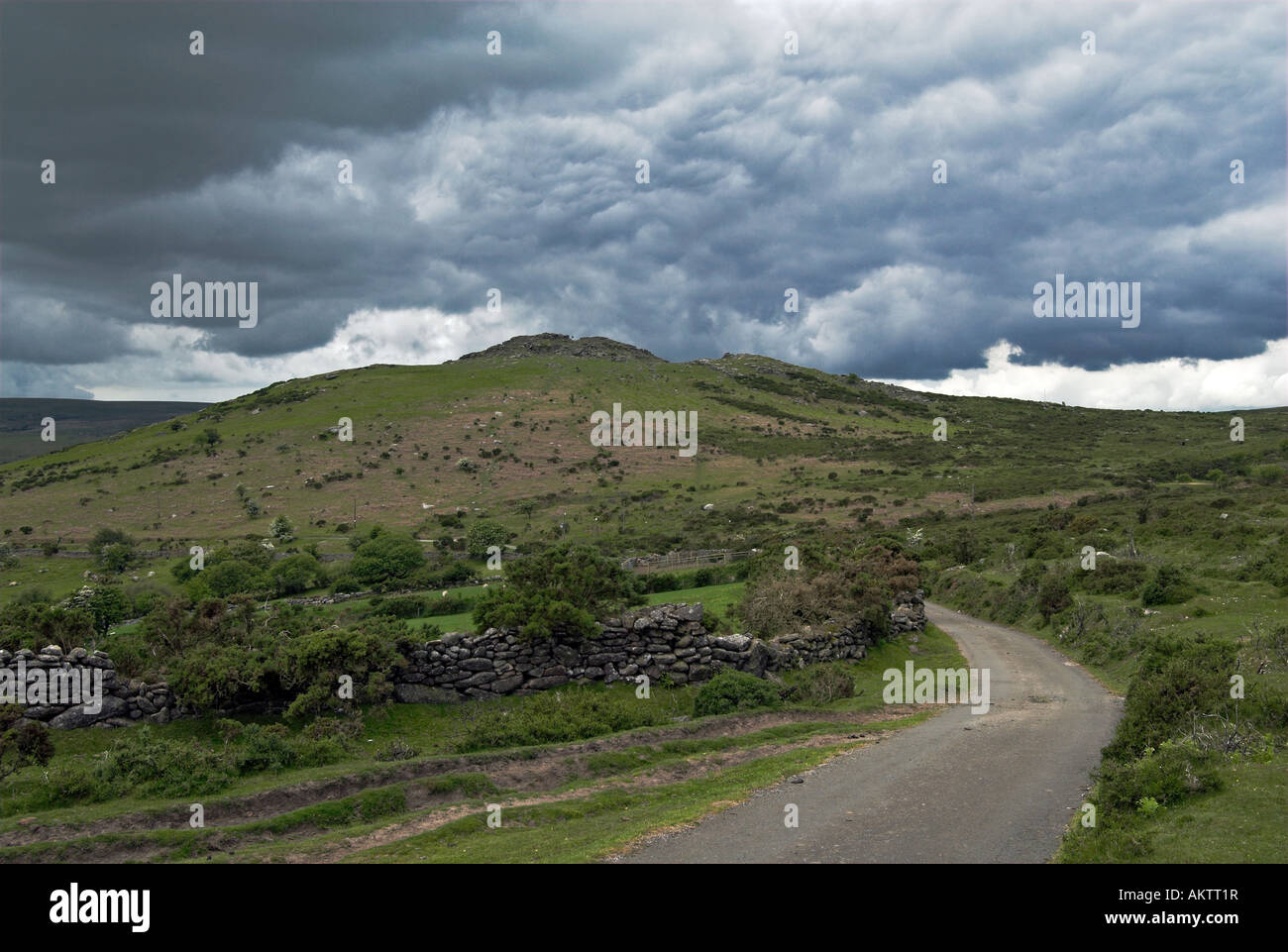 Heavy rain clouds over Sharp Tor in Dartmoor, Devon Stock Photo - Alamy
