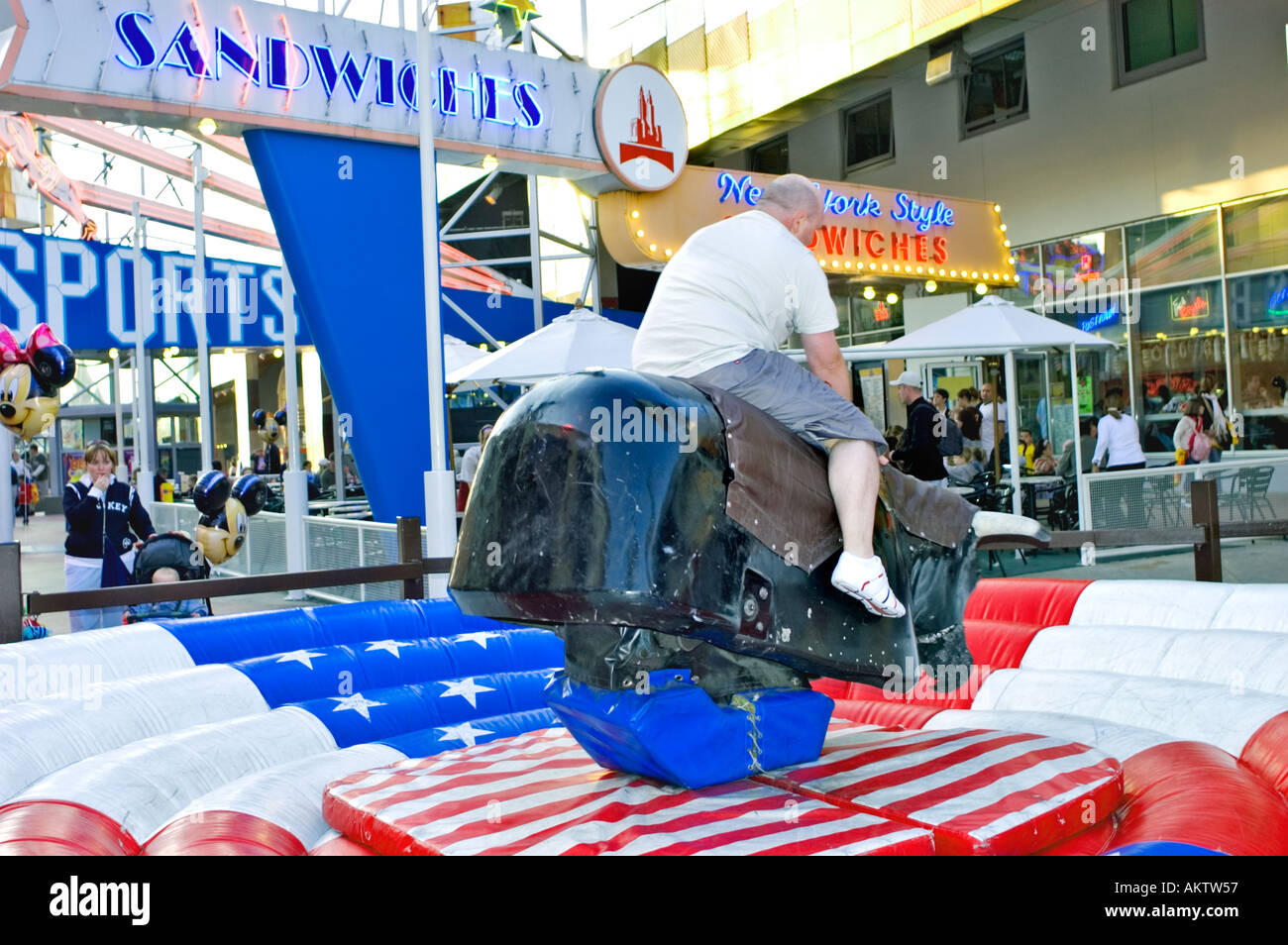 Paris FRANCE, Amusement Parks Disneyland Paris, Man Riding "Wild Bull ...