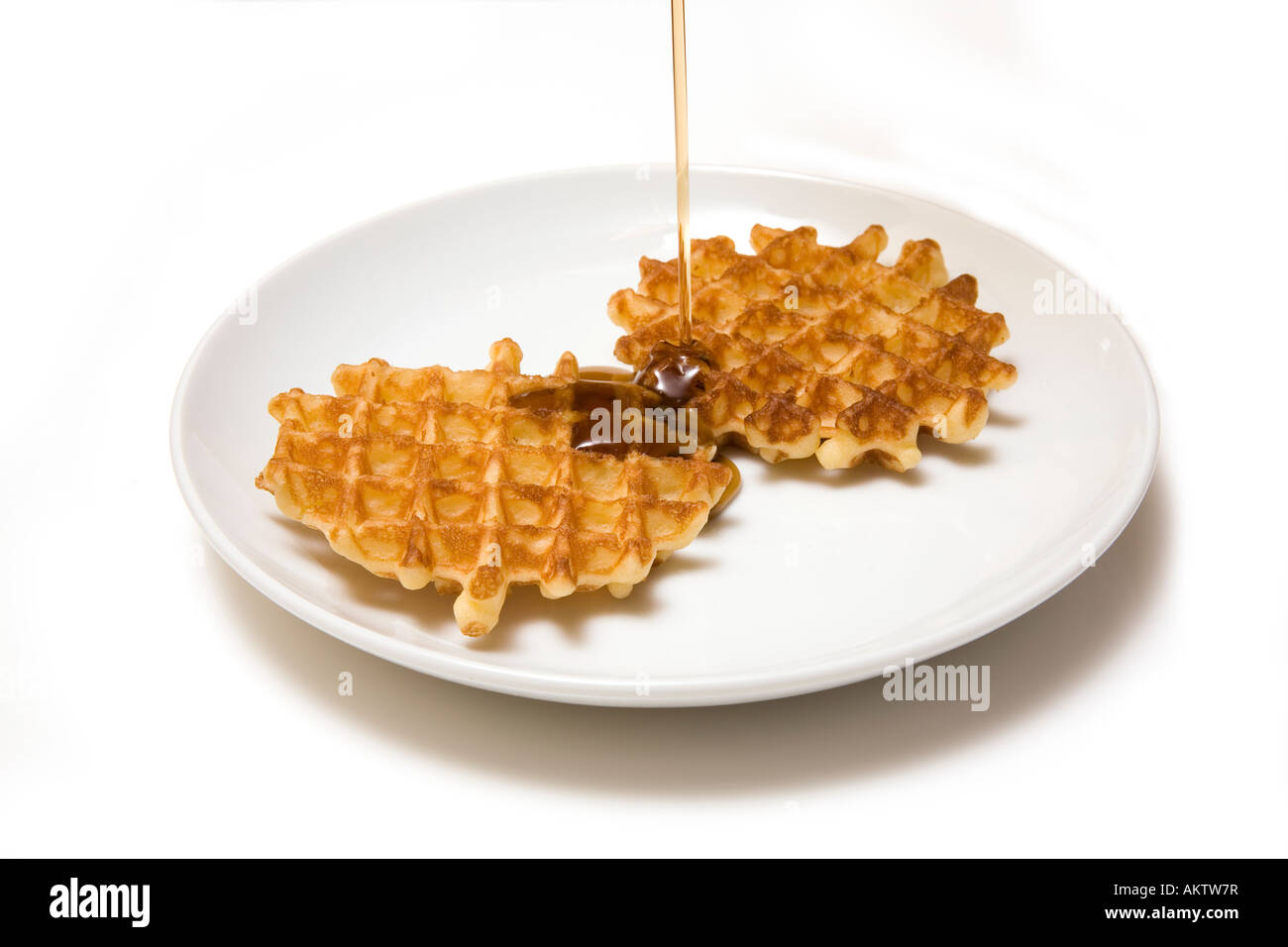 Belgian butter waffles isolated on a white studio background Stock ...