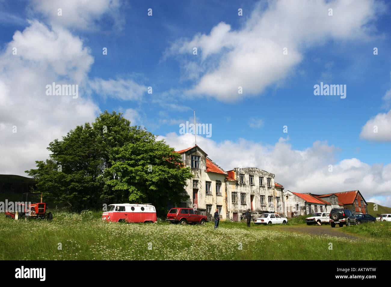 an old derelict farmhouse cars and broken stuff around Stock Photo - Alamy