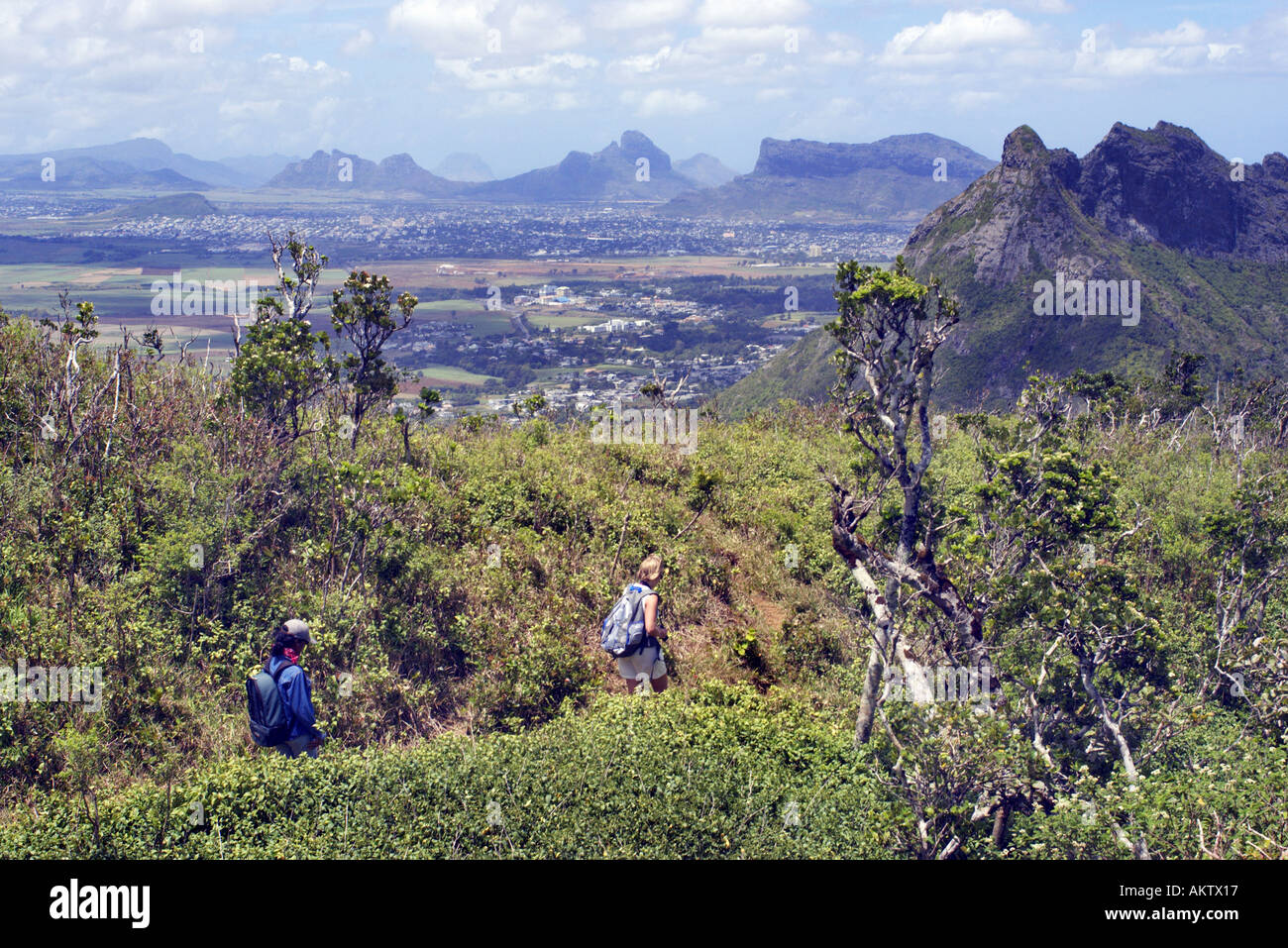 two women clearing a path Stock Photo - Alamy