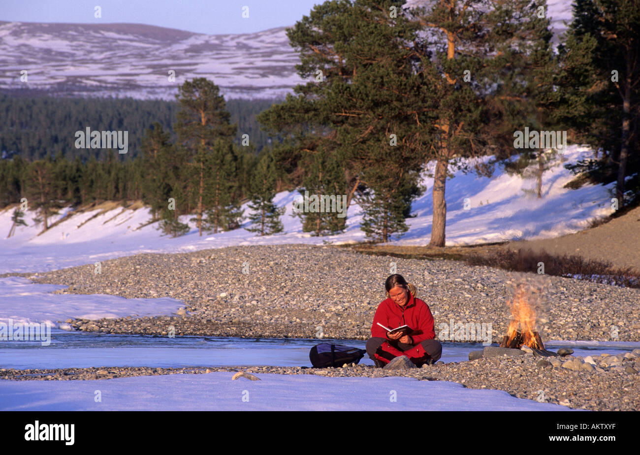 Sitting beside fire hi-res stock photography and images - Alamy