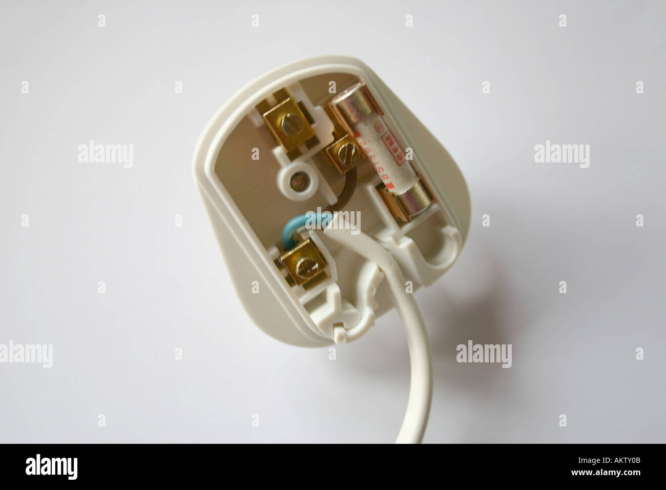Three pin electrical plug irish and british standard Stock Photo - Alamy