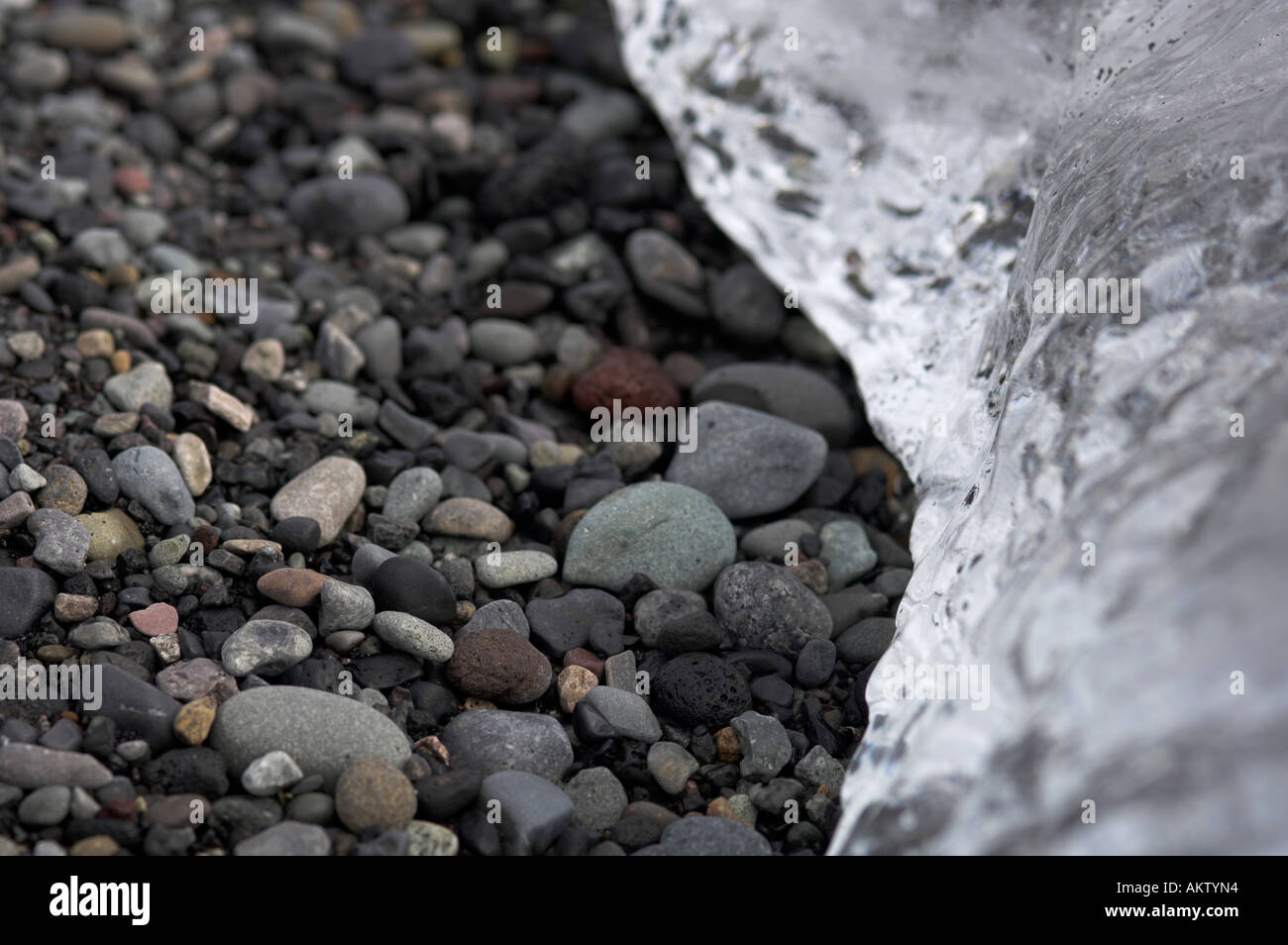 Ice and stones Stock Photo - Alamy