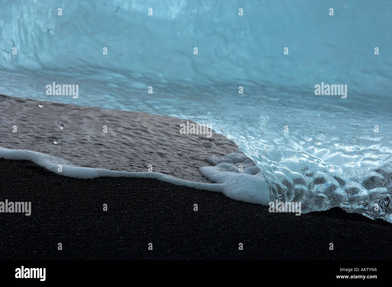 Ice block lying on the beach. Iceland Stock Photo - Alamy