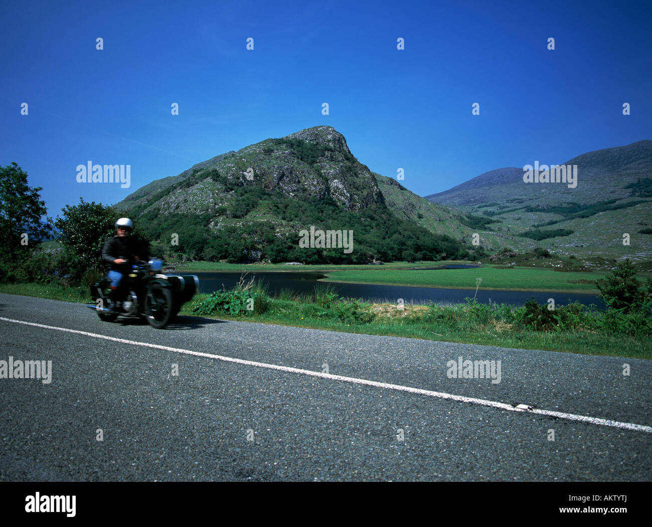 vintage motorcycle on an irish country road ring of kerry Stock Photo ...