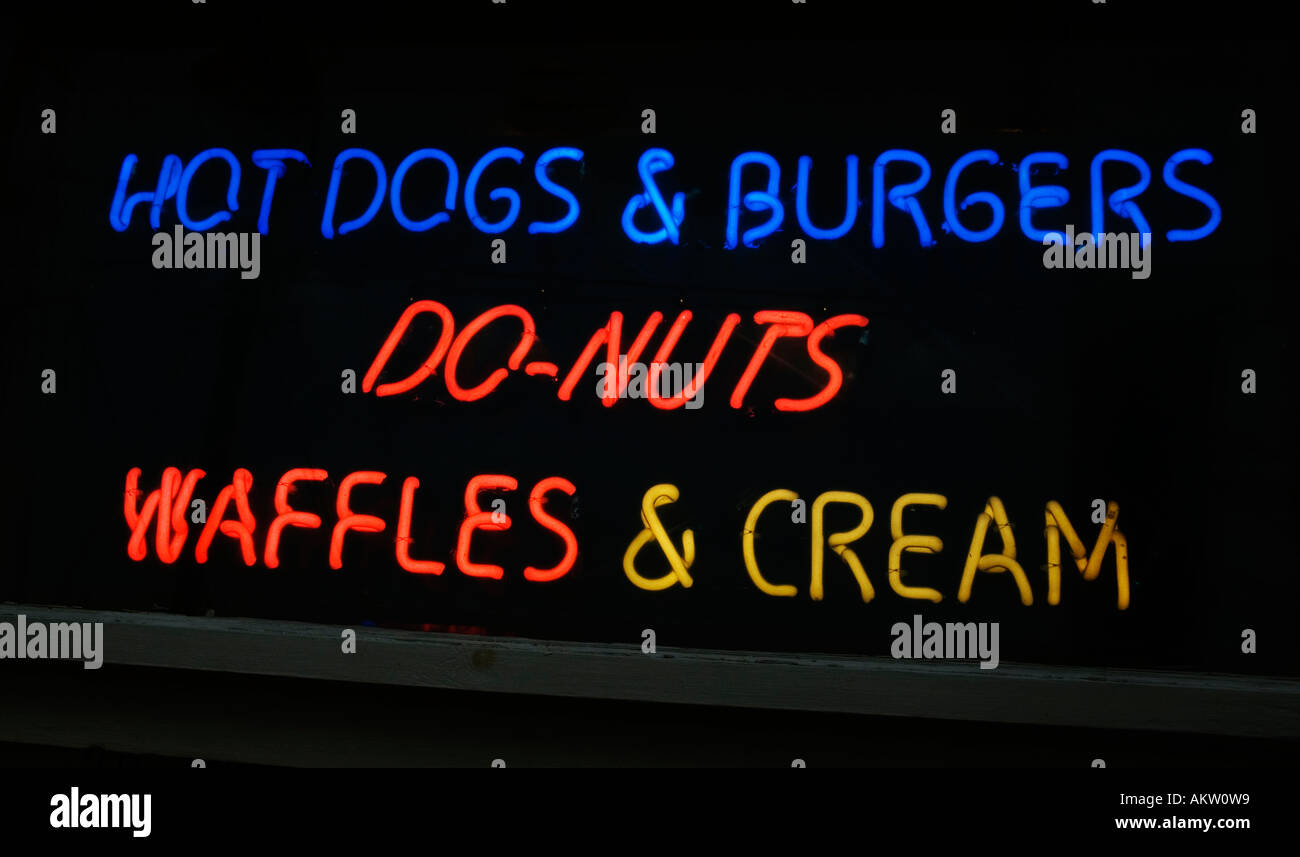 Neon sign for a fast food shop, Hot dogs, burgers, do-nuts, waffles ...