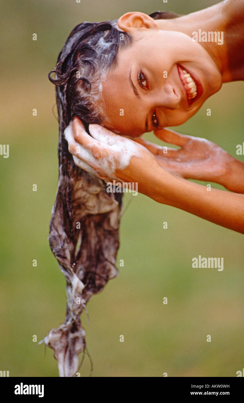 Girl washing her hair Stock Photo - Alamy