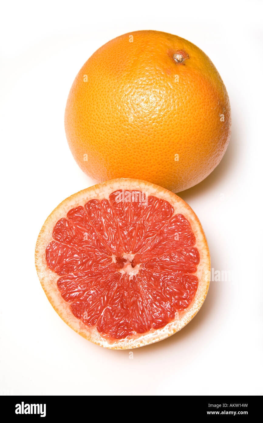 Blood Grapefruit whole and halved isolated on a white studio background ...