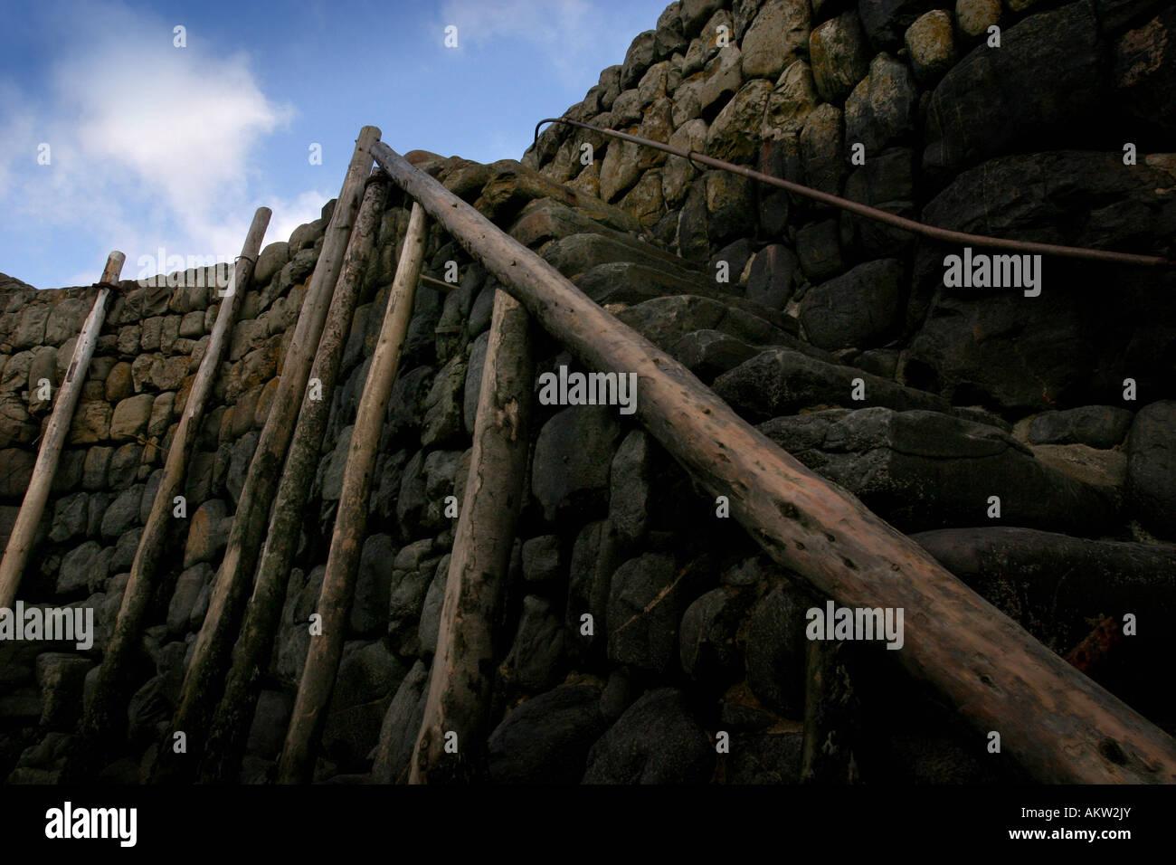 Granite steps Harbour wall Clovelly North Devon UK Stock Photo - Alamy