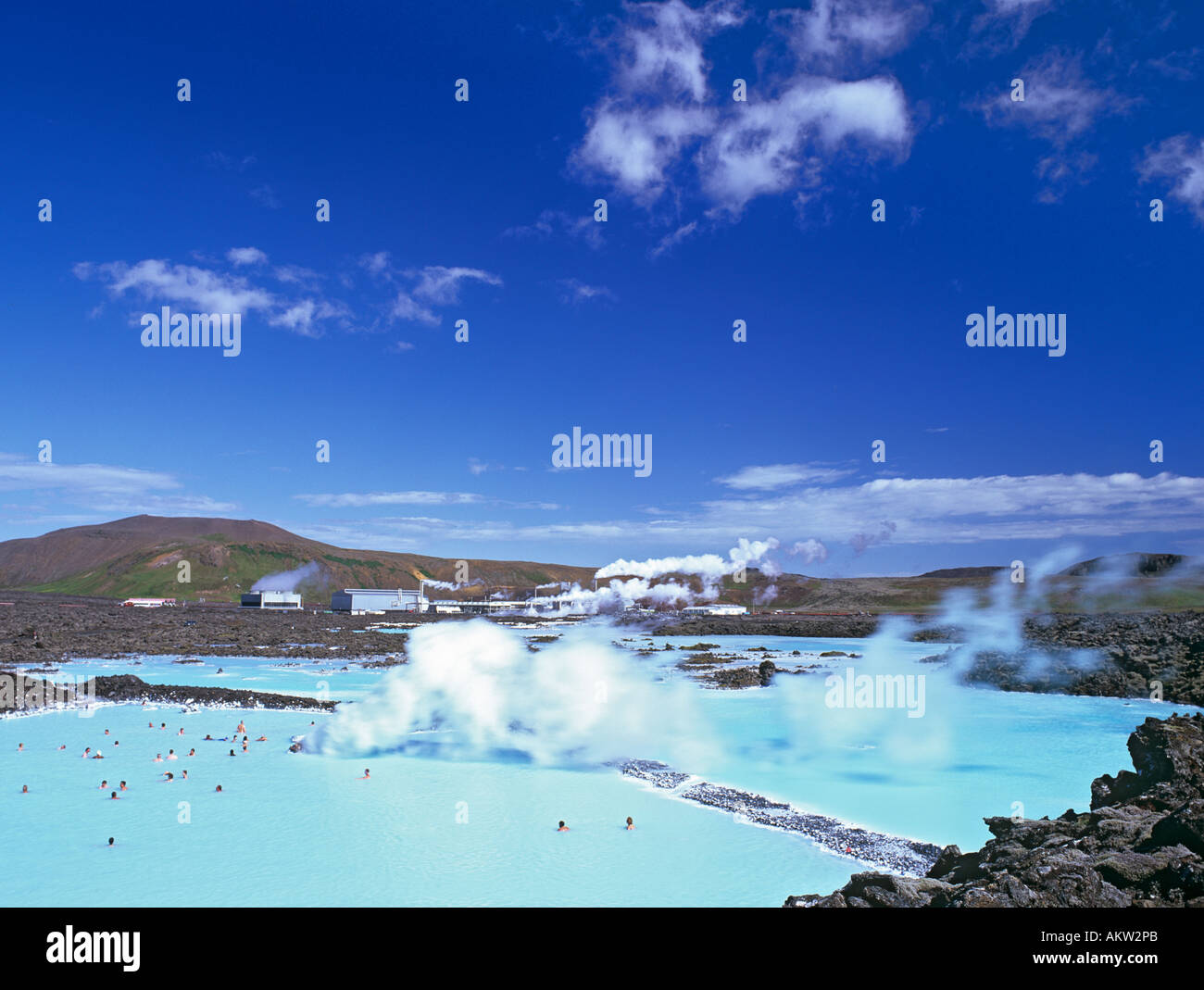 Blaa Lonid Iceland. Blue Lagoon with people swimming in milky blue ...
