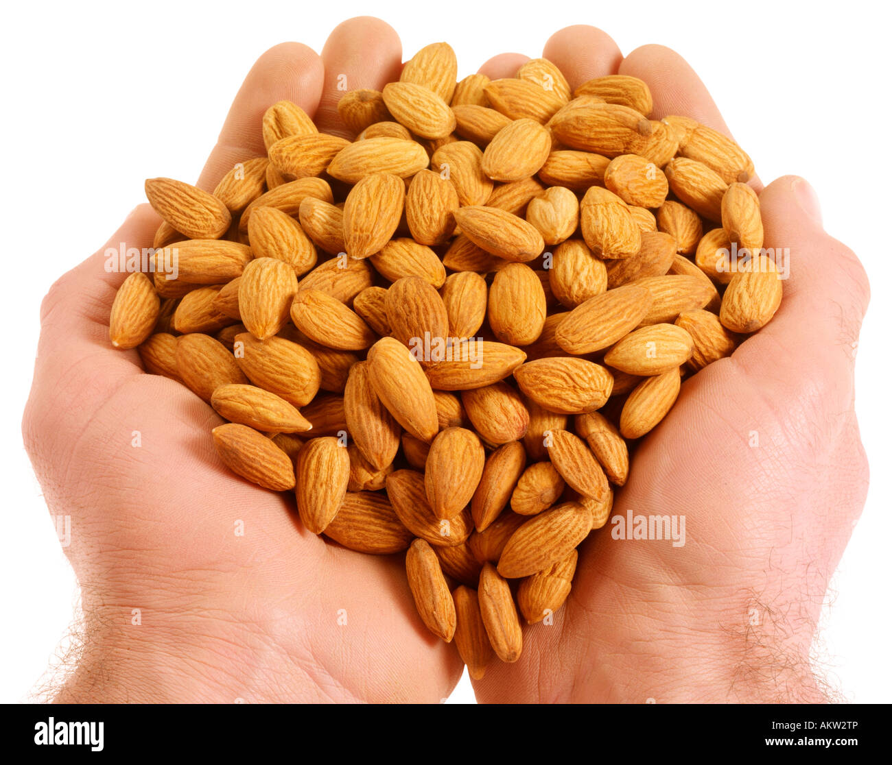 HANDFUL OF ALMONDS Stock Photo - Alamy
