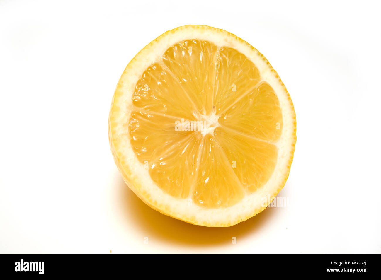 Lemon halved and isolated on a white studio background Stock Photo - Alamy