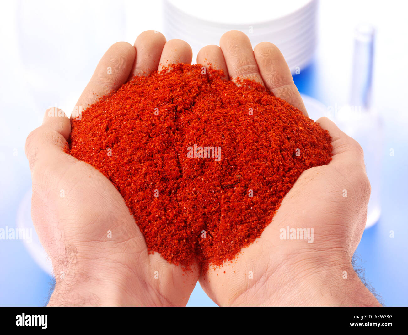 HANDFUL OF CHILLI POWDER Stock Photo - Alamy