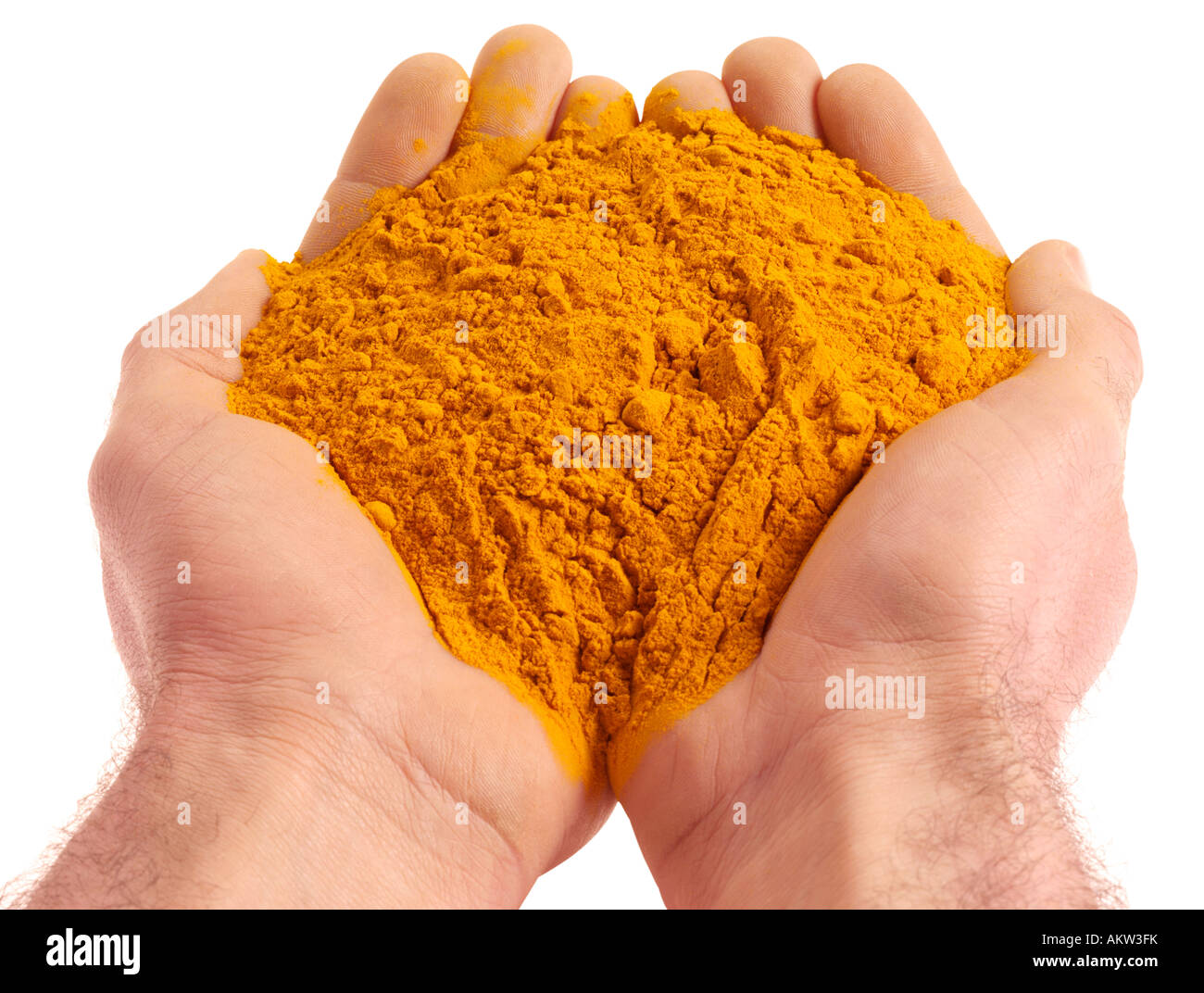 HANDFUL OF TUMERIC Stock Photo - Alamy