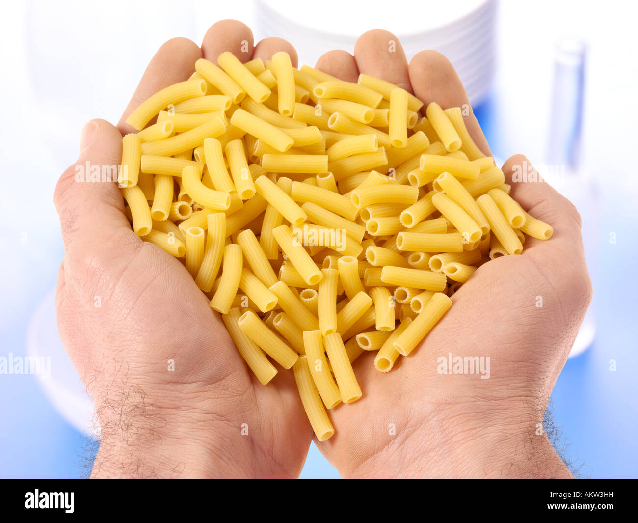 HANDFUL OF MACARONI PASTA Stock Photo - Alamy