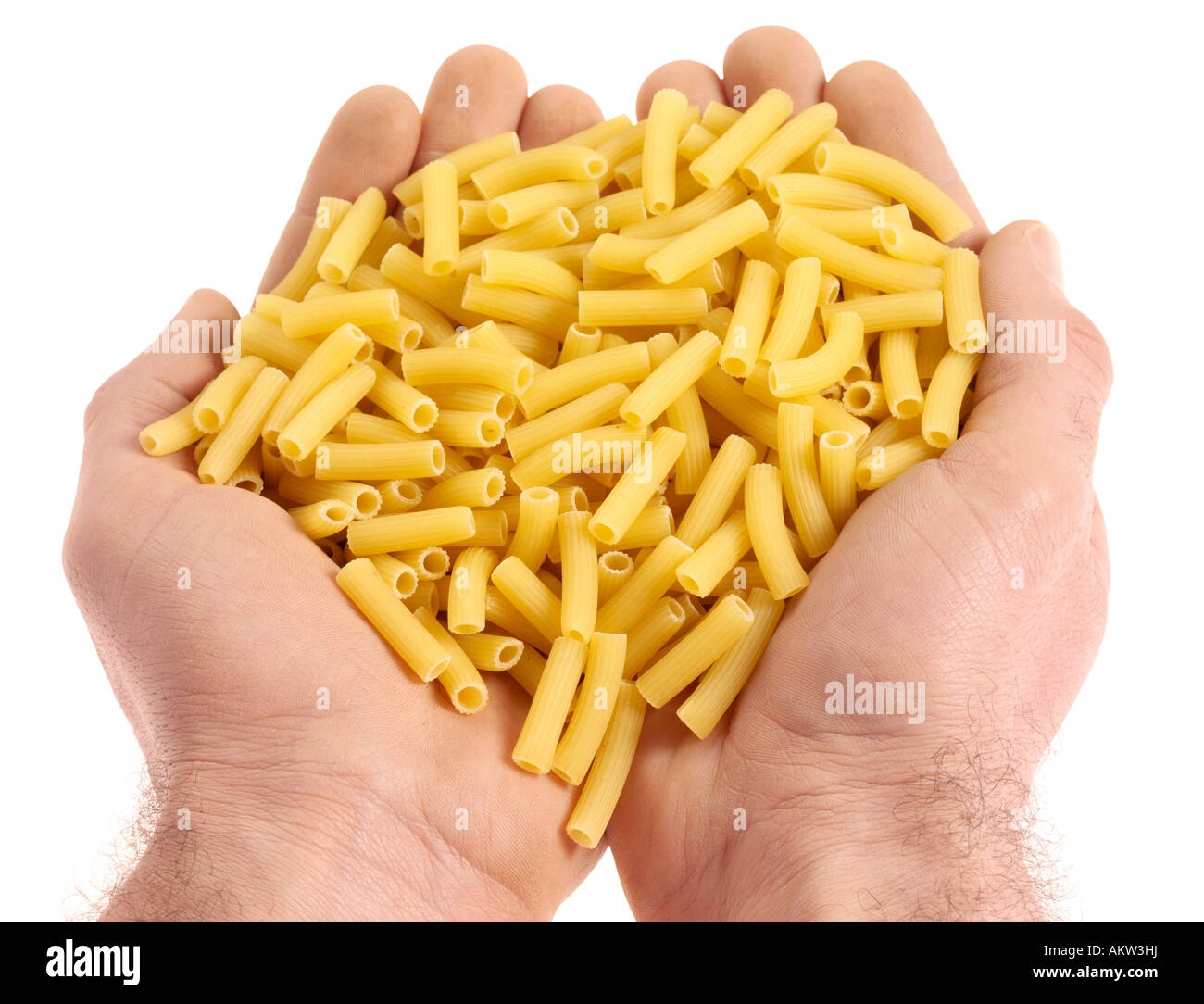 HANDFUL OF MACARONI PASTA Stock Photo - Alamy