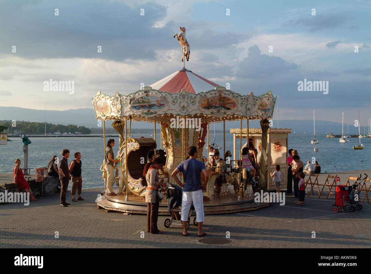 Geneva. Lake Geneva. Merry-go-round. Jet d'Eau Stock Photo - Alamy