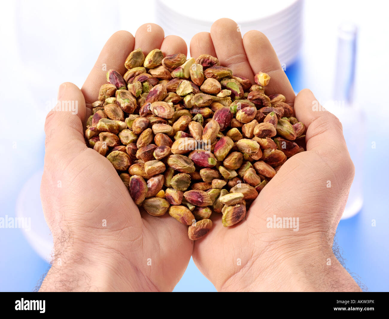 HANDFUL OF PISTACHIO NUTS Stock Photo - Alamy