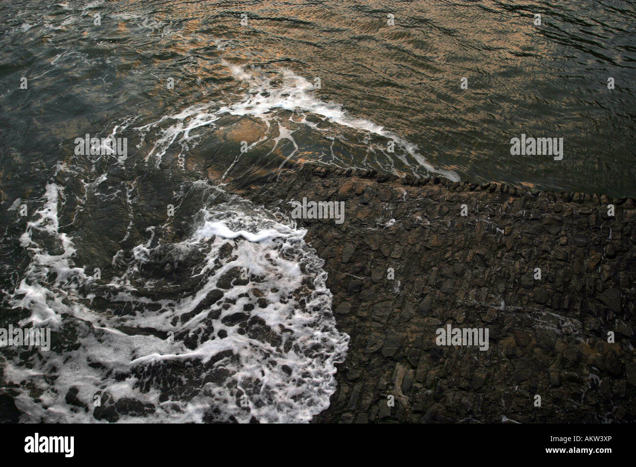 tide washing over slipway Stock Photo - Alamy