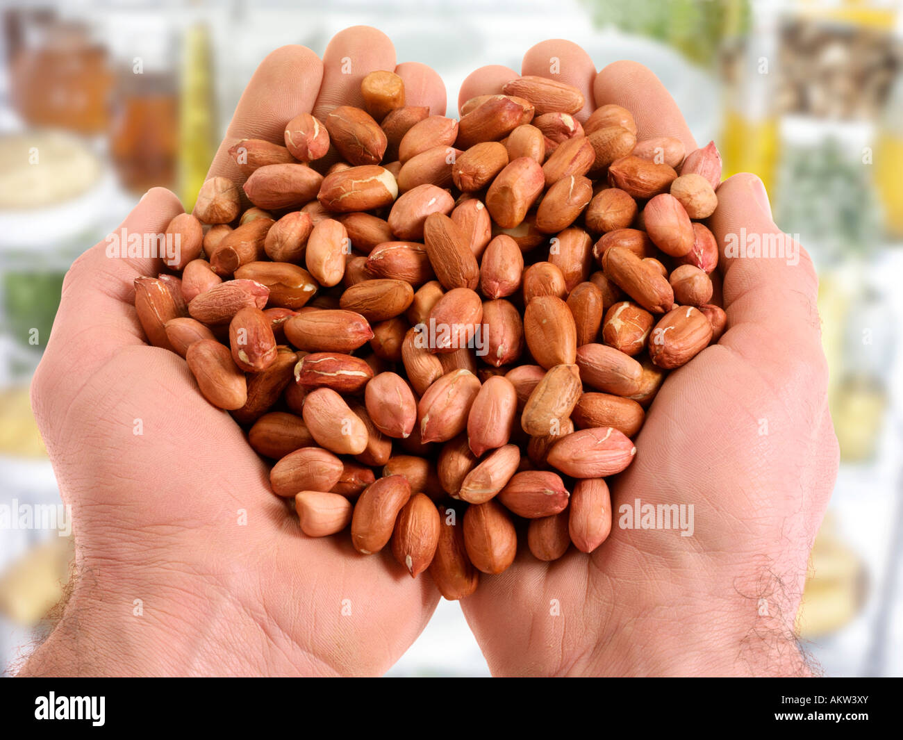 Red skin peanuts hi-res stock photography and images - Alamy