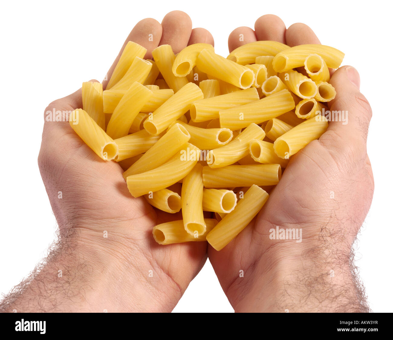 HANDFUL OF RIGATONI PASTA Stock Photo - Alamy