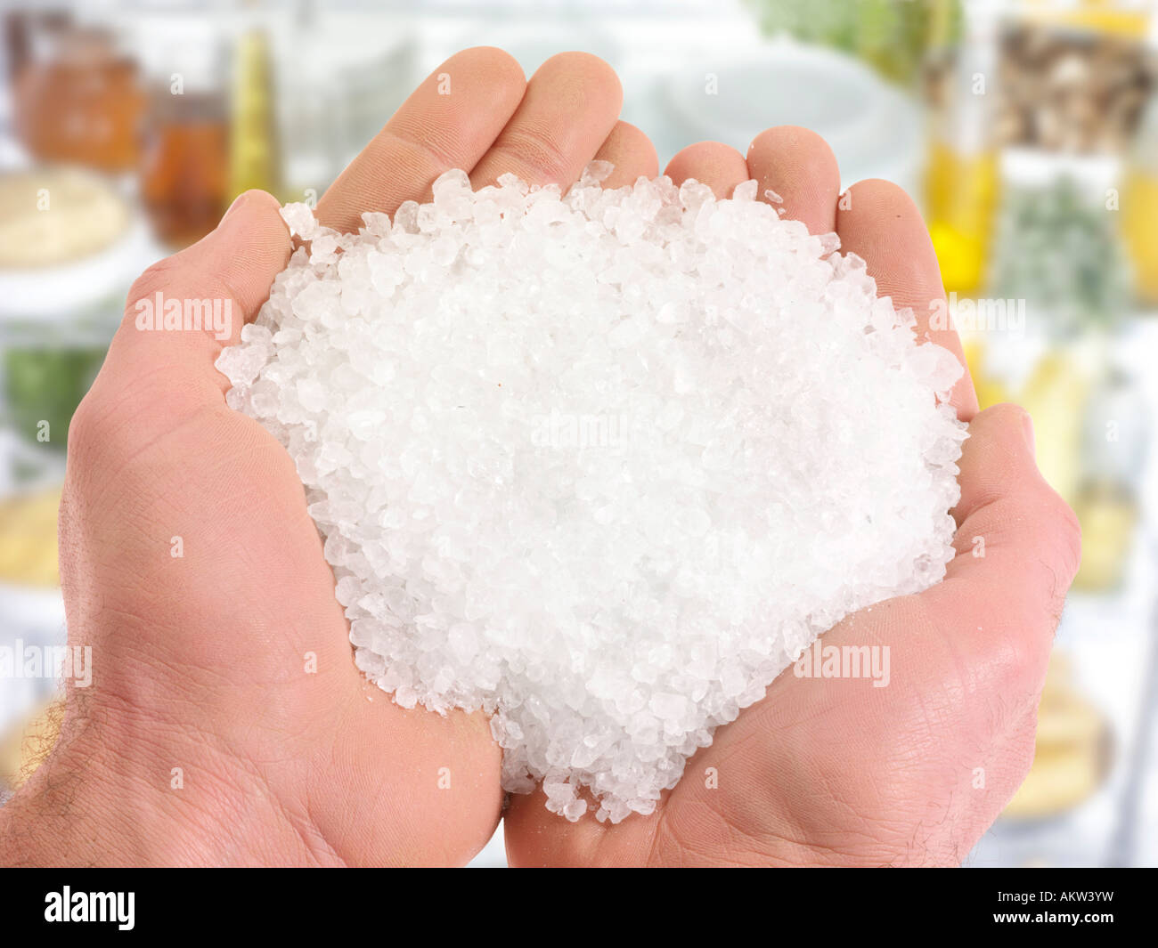 HANDFUL OF SEA SALT Stock Photo - Alamy