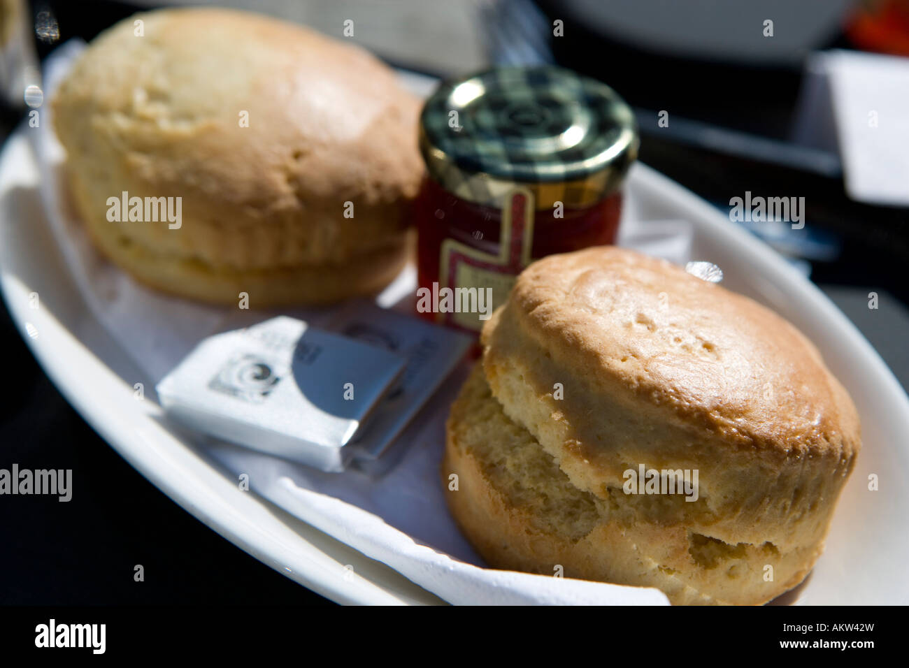Traditional British cream tea with scones, jam and cream Stock Photo ...