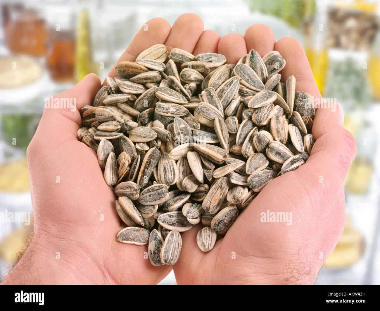 HANDFUL OF SUNFLOWER SEEDS Stock Photo - Alamy
