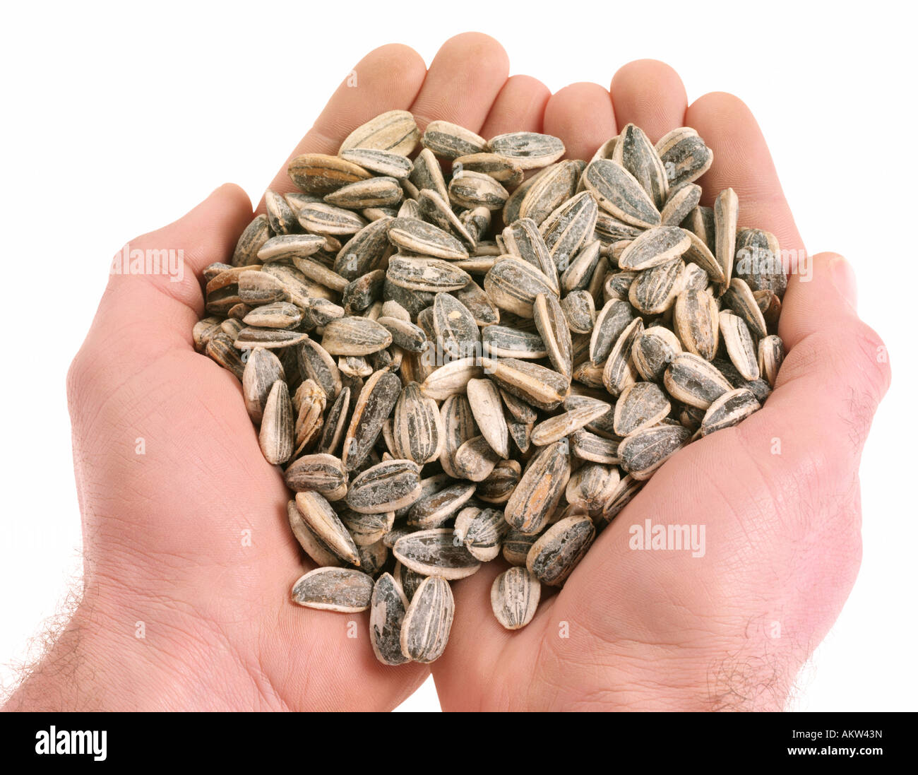 HANDFUL OF SUNFLOWER SEEDS Stock Photo - Alamy