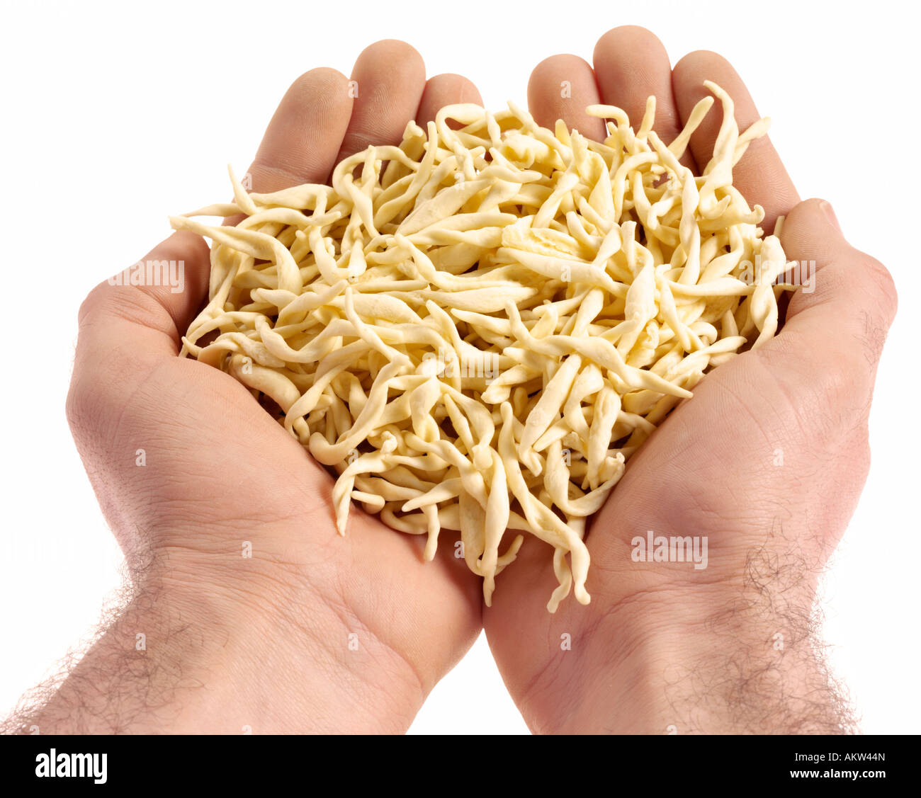 HANDFUL OF TROFIE PASTA Stock Photo - Alamy