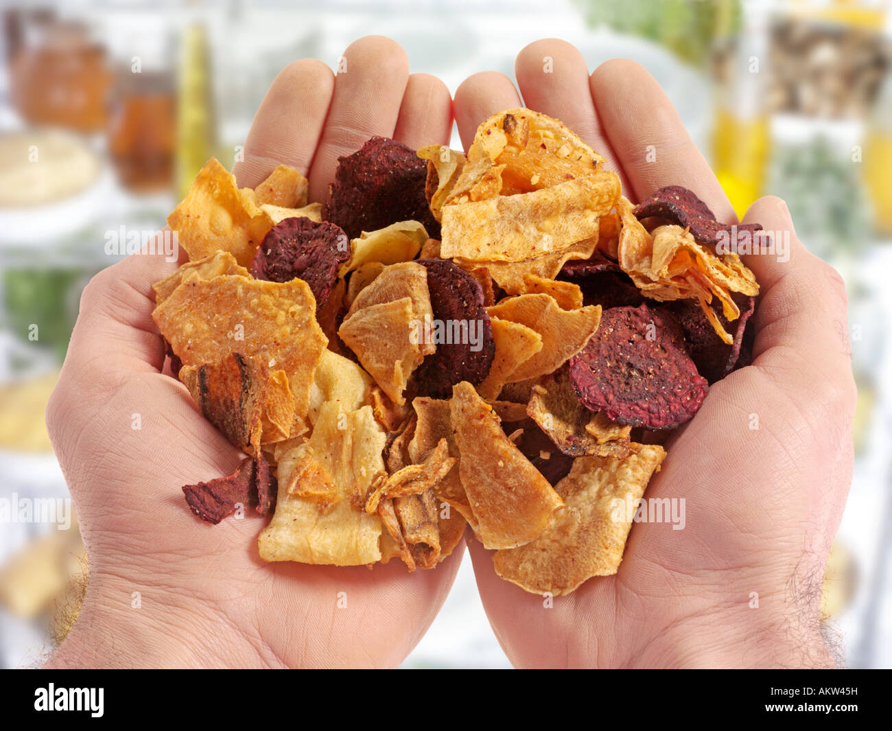 Crisps hands hi-res stock photography and images - Alamy