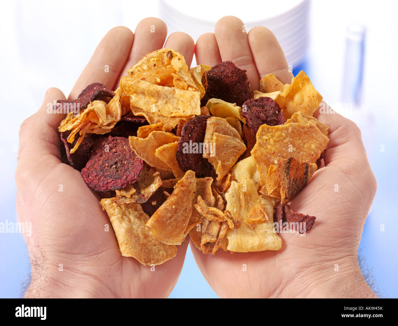 Crisps hands hi-res stock photography and images - Alamy