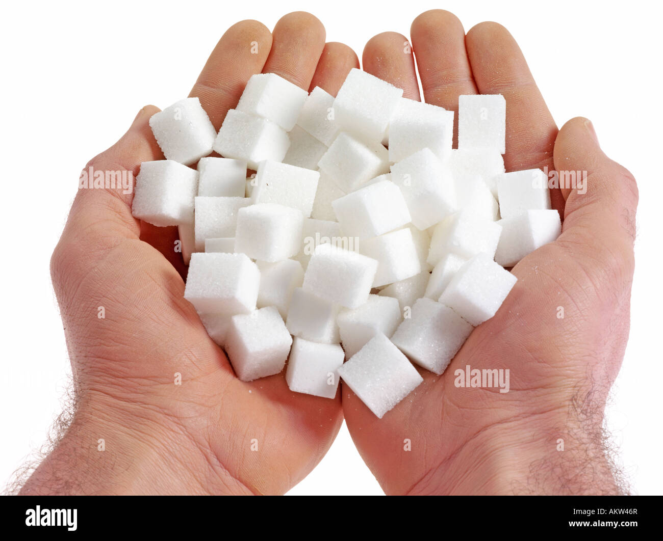 HANDFUL OF WHITE SUGAR CUBES Stock Photo - Alamy