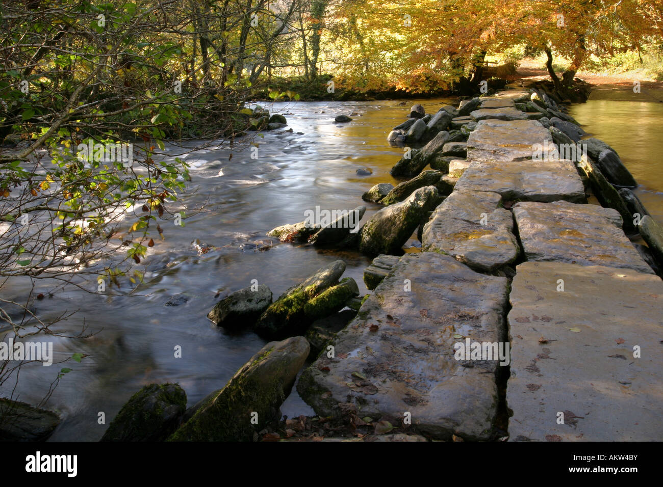 The Tarr Steps Ancient Stone Bridge , Exmoor , Somerset UK Stock Photo ...