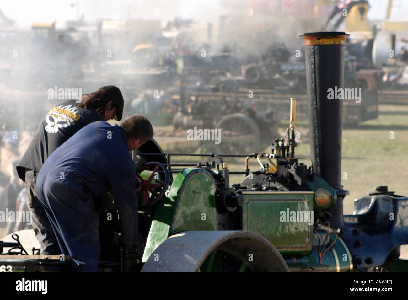 Close up of men driving vintage steam roller at Great Dorset Steam ...