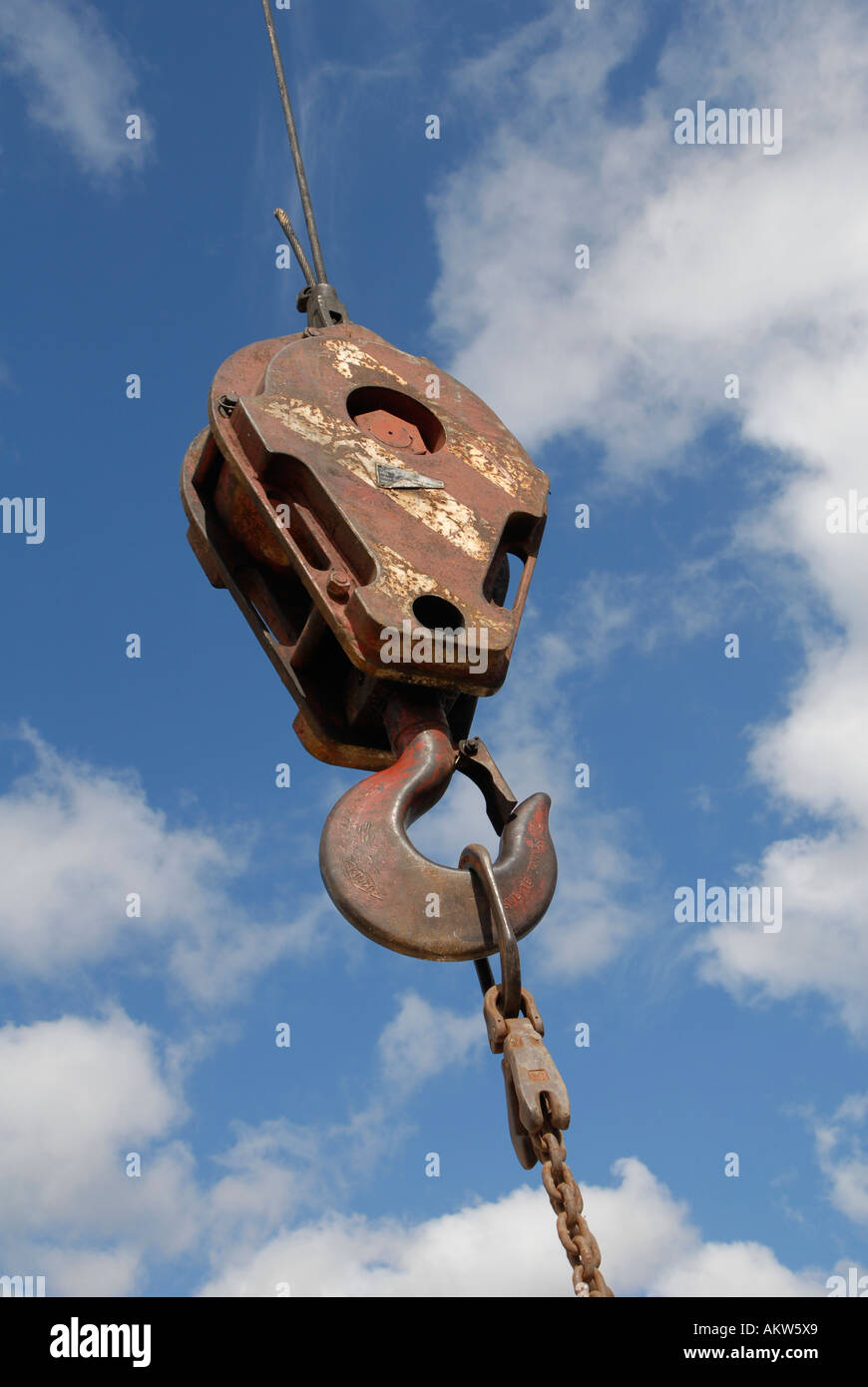 Crane hoist lifting a load on a building site in the uk Stock Photo - Alamy