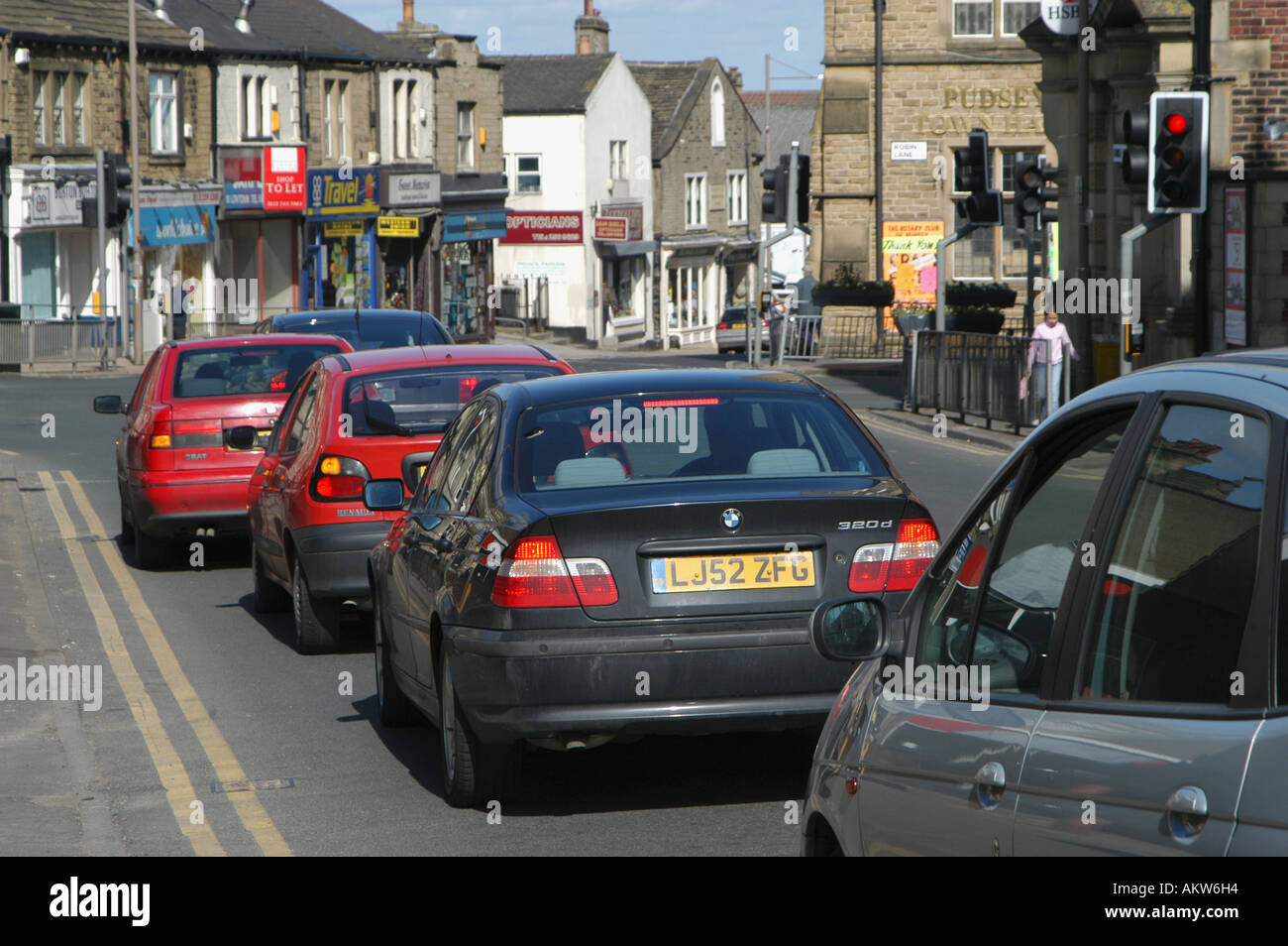 Queue of traffic waiting at traffic lights in Pudsey North Yorkshire ...