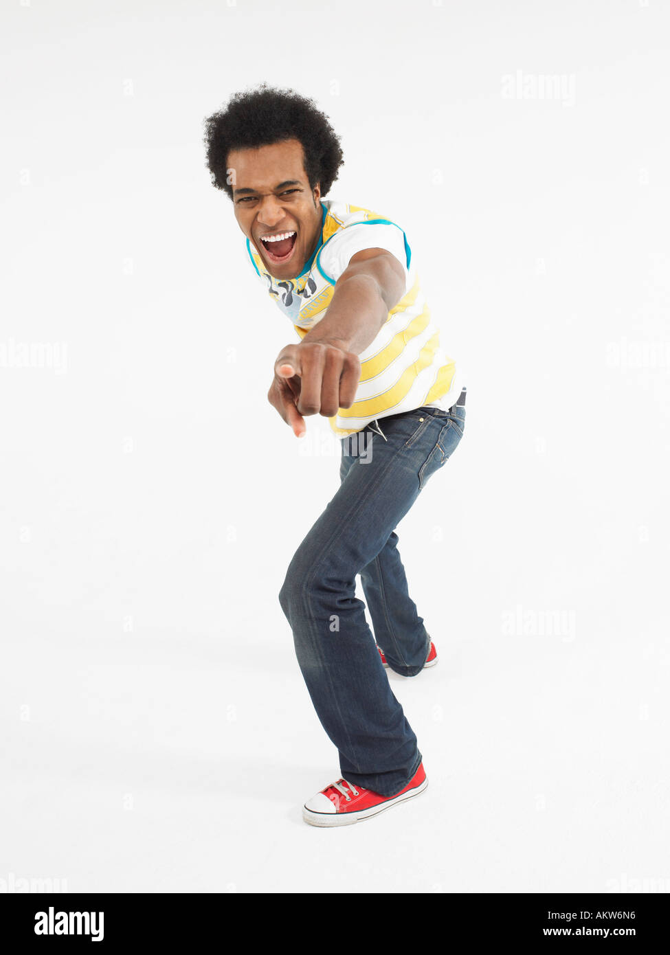 Man pointing in studio full hi-res stock photography and images - Alamy