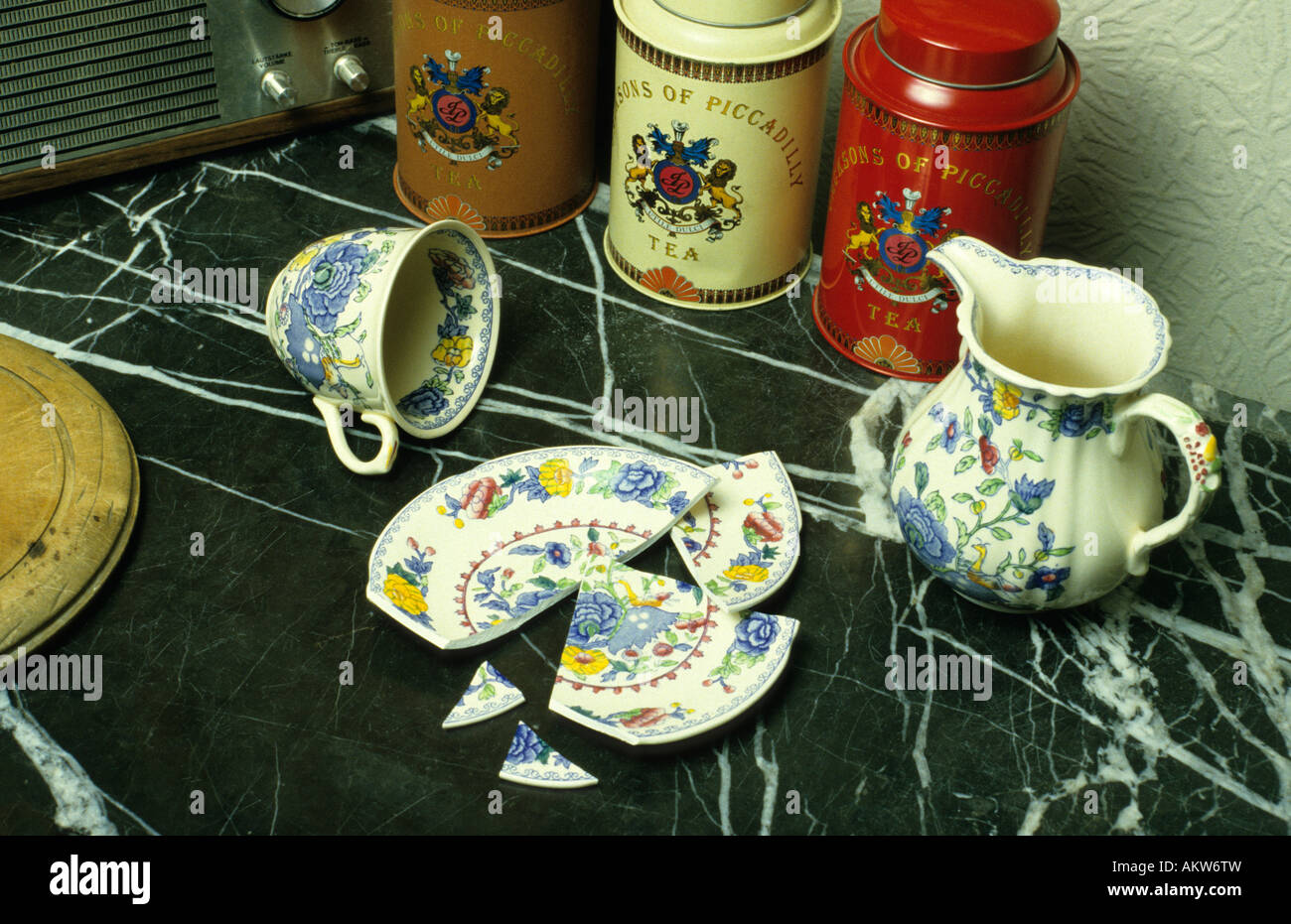 Broken crockery on kitchen worktop Stock Photo - Alamy