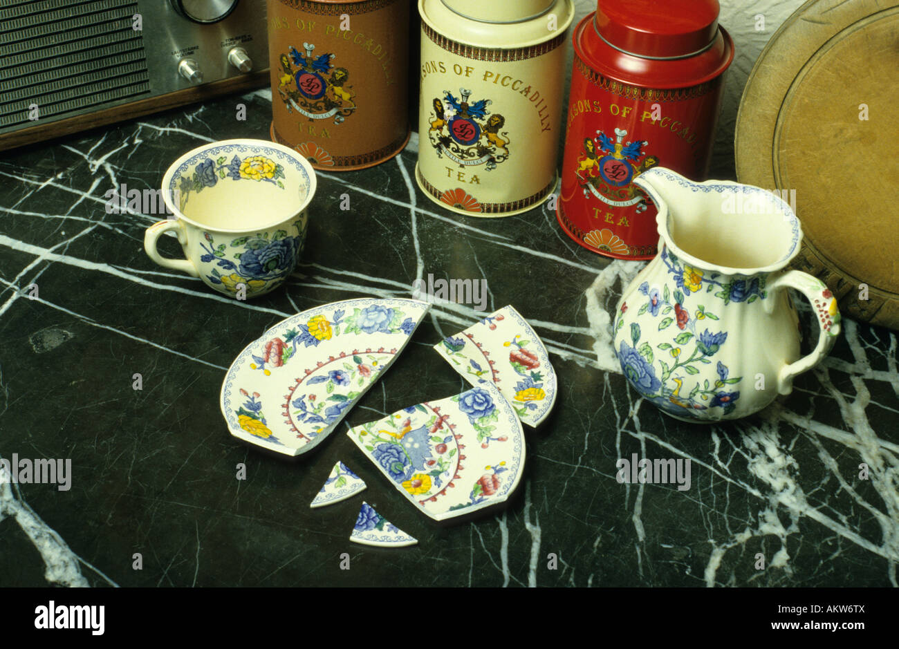 Broken crockery on kitchen worktop Stock Photo - Alamy