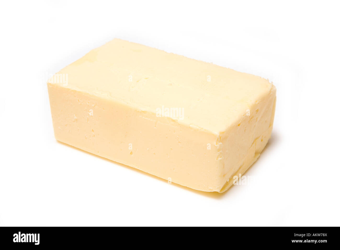 Slab of traditional organic butter isolated on a white studio ...