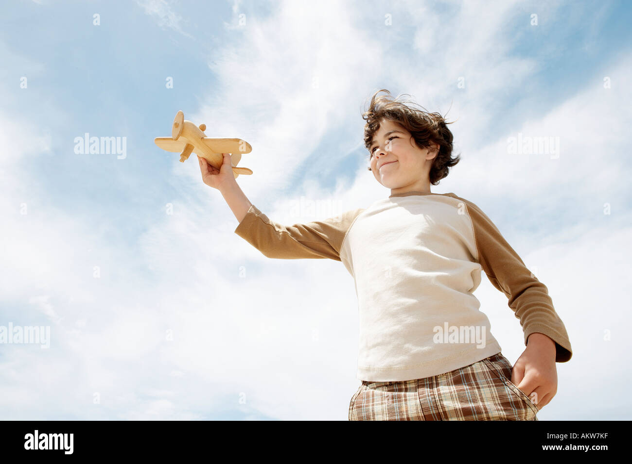 Boy launching airplane hi-res stock photography and images - Alamy