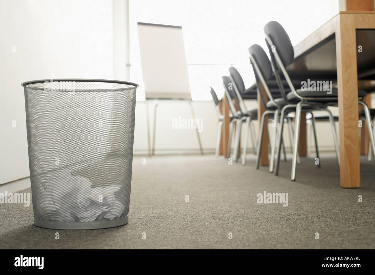 Trash Can in Empty Meeting Room Stock Photo - Alamy