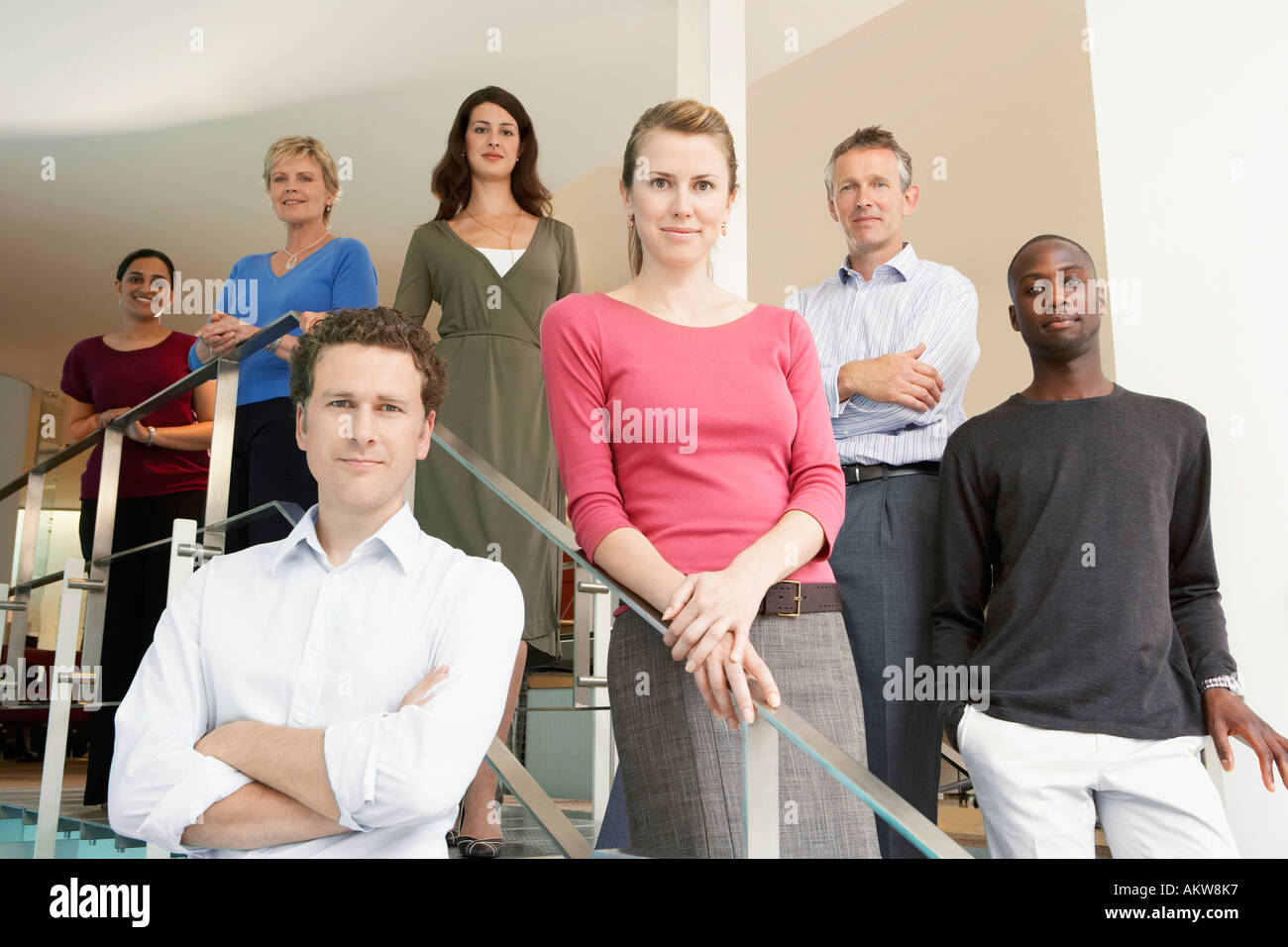 Group of Office Workers Posing on Office Steps, portrait Stock Photo ...