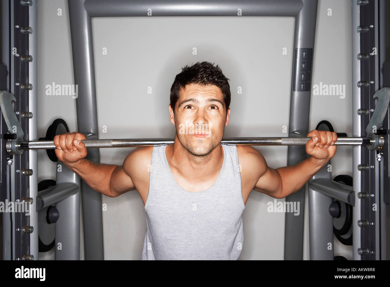 Man struggling to lift weights hi-res stock photography and images - Alamy