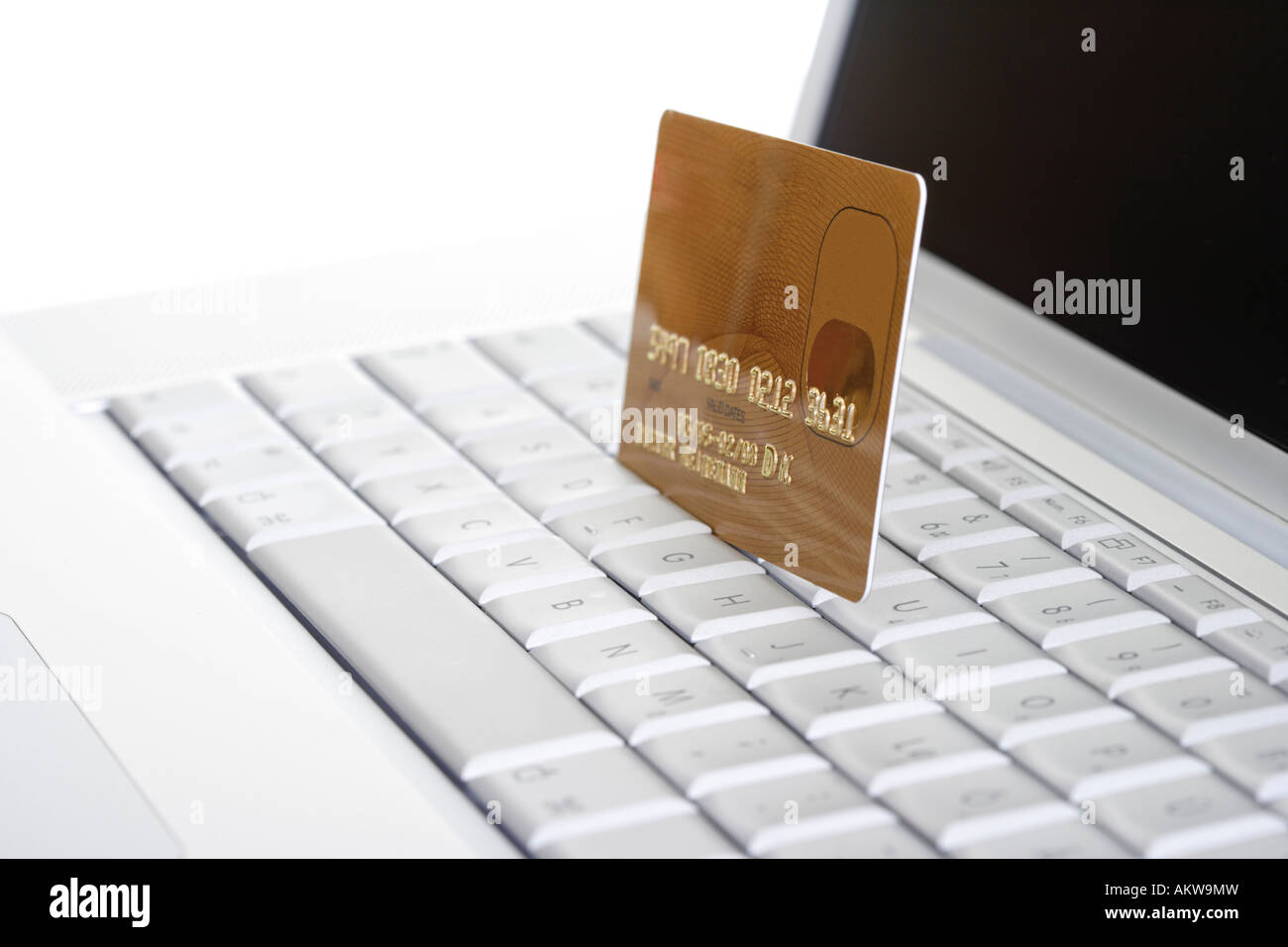 credit card on computer keyboard, close-up Stock Photo - Alamy