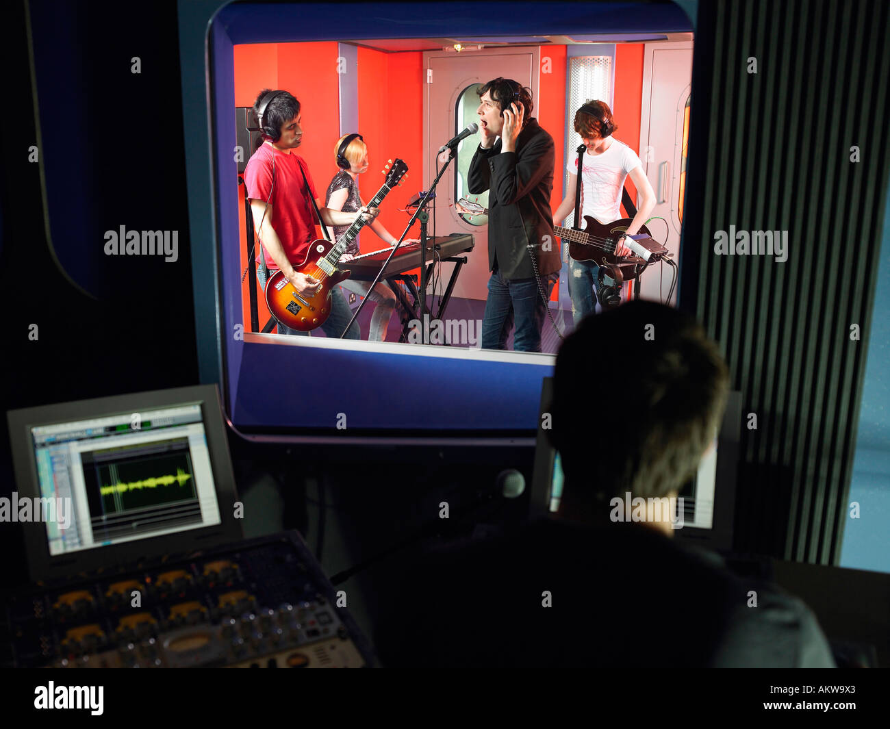 Musical group in recording studio hi-res stock photography and images ...