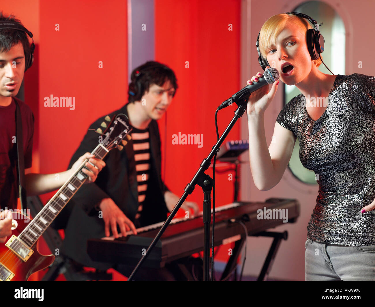 Band in recording studio Stock Photo - Alamy